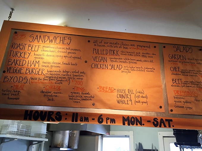 The handwritten menu board tells you everything you need to know: real ingredients, scratch-made goodness, and sandwiches worth crossing state lines for.