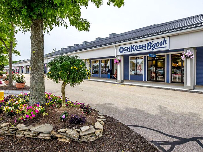 OshKosh B'gosh welcomes families with vibrant landscaping and classic New England architecture &ndash; where children's fashion meets Maine's charming aesthetic.