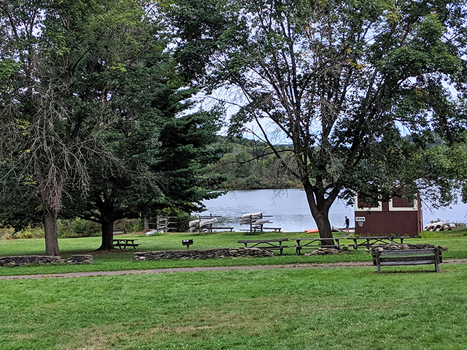 Picnic perfection awaits with lakeside tables where sandwiches somehow taste better with a side of scenery.