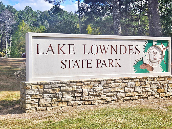 First impressions matter! The welcoming stone entrance sign promises adventures that live up to its rustic elegance.