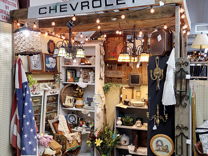 Beneath twinkling string lights, this Americana wonderland feels like stepping into your coolest grandparent's attic—if they collected Chevrolet signs and Tiffany-style lamps.