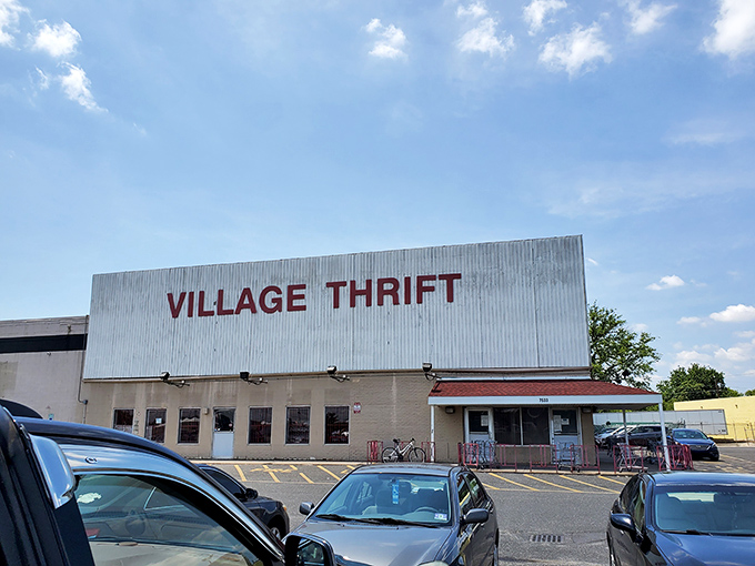 Village Thrift's unassuming exterior hides a warehouse of wonders. Like finding a speakeasy, the real magic happens once you're through those doors.