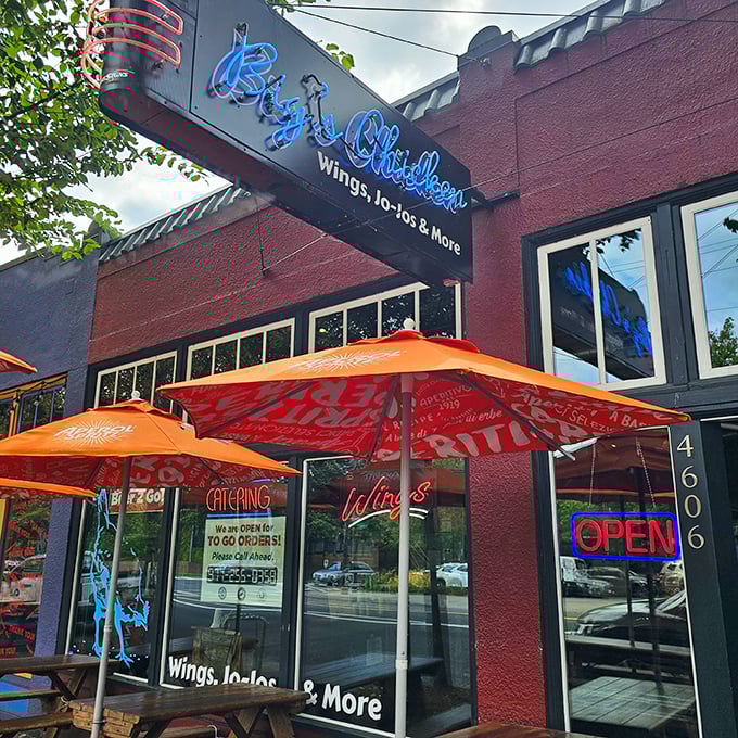 Big's Chicken's vibrant red building is like a beacon for the hungry. Those orange umbrellas practically scream "summer chicken feast!"