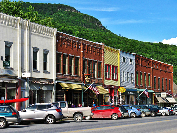 Bristol's colorful storefronts nestle beneath Mount Abraham like jewels at the foot of a sleeping giant.