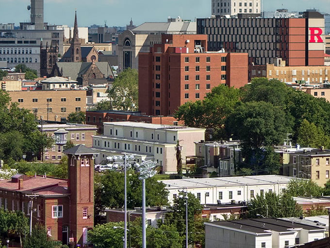 Camden's skyline showcases Rutgers University buildings amid the urban landscape, offering education and opportunity to residents.