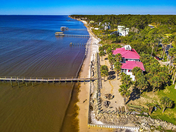 Carrabelle's working waterfront buzzes with authentic coastal life where shrimp boats dance with pelicans.