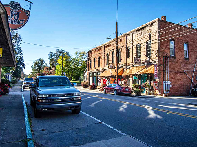 Historic brick storefronts line Cave Spring's sunny main street, where time seems to stand perfectly still.