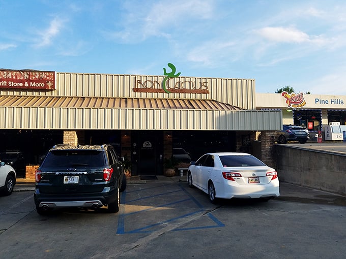 Iron Cactus stands proud against the sky, a humble strip mall treasure where culinary magic happens daily.