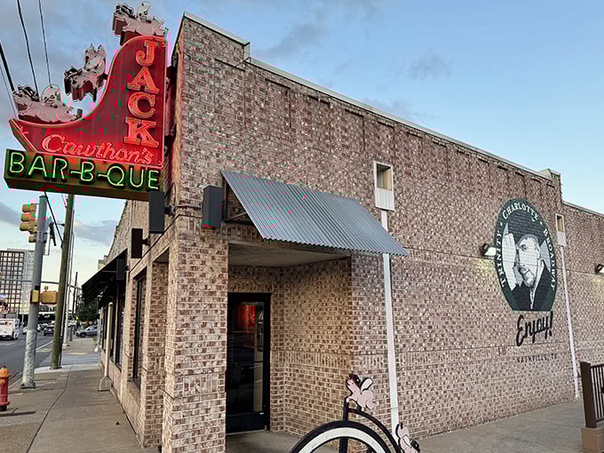 Jack's iconic red sign against weathered brick - like a BBQ bat signal calling hungry Nashvillians to smoky salvation.