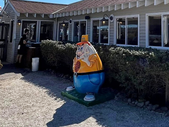 At Mud City Crab House, even the mascot looks delicious! This cheerful buoy-man welcomes you to a world of crustacean delights.
