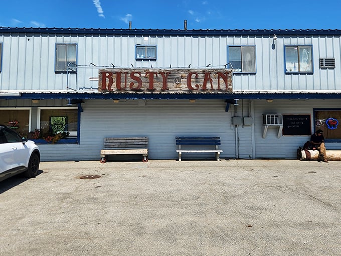 Rusty Can exterior: This weathered blue building with its rustic sign is the BBQ equivalent of finding a vintage Corvette in your uncle's barn.