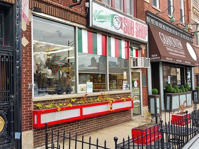 Vinnie's colorful Italian-flag awning signals authentic sub sandwich paradise in the heart of Chicago.