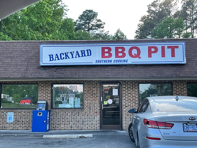 Don't let the humble storefront fool you&mdash;Backyard BBQ Pit serves up smoke-kissed perfection that will haunt your dreams in the best possible way.