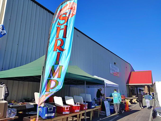 The "Shrimp" flag waves like a beacon for hungry shoppers at Brightleaf. Come for the bargains, stay for the unexpected food finds.