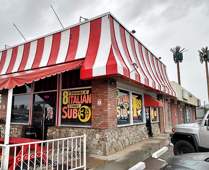 Captain Bill's iconic striped awning stands out like a lighthouse guiding hungry sailors to sandwich harbor.