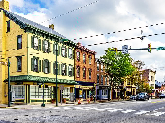 Historic buildings with colorful facades line Carlisle's walkable main street, showcasing the town's charming character.