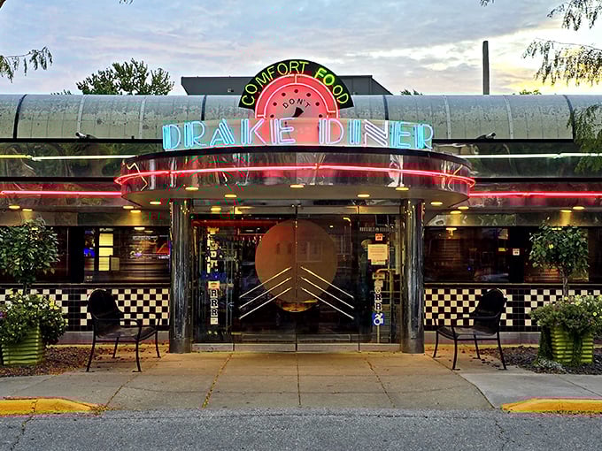 As evening falls, Drake Diner's neon glow promises "Comfort Food" that delivers exactly what your soul has been craving all day.