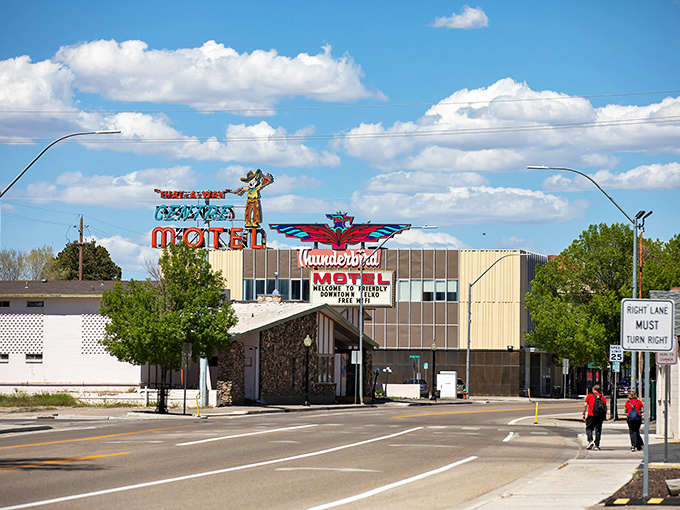 The Thunderbird Motel sign stands sentinel in Elko, a neon beacon from simpler times when road trips meant unexpected adventures and local diners.