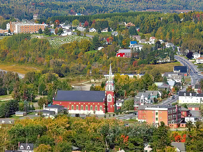 The iconic red-brick church anchors Fort Kent's skyline, a testament to community values and the affordable northern Maine lifestyle.