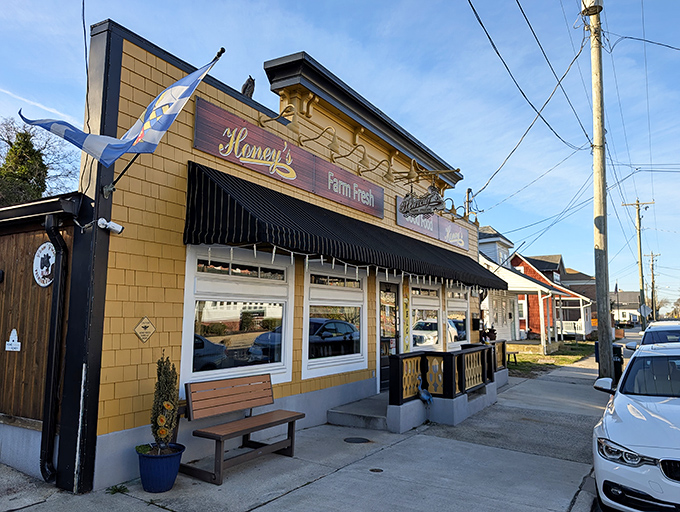 The patriotic bunting and golden storefront promise farm-fresh comfort food that grandma would approve of.