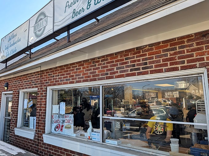 A sandwich shop that doesn't need fancy frills&mdash;just look at that sign promising deli items, tasty sandwiches, and fresh bread!