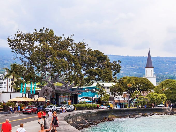 Kailua-Kona's historic waterfront blends island charm with stunning ocean views, where church steeples rise above swaying palms.