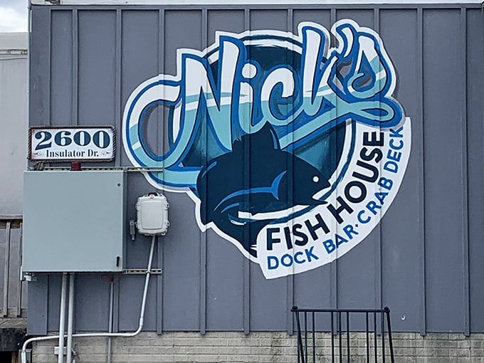 The weathered sign at this waterfront gem proves that the best crab cakes come from places that smell like salt air.