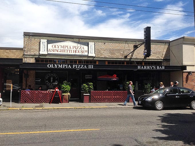 Harry's Bar sign promises the perfect pairing to your pizza&mdash;a cold drink and that neighborhood vibe we're all searching for.