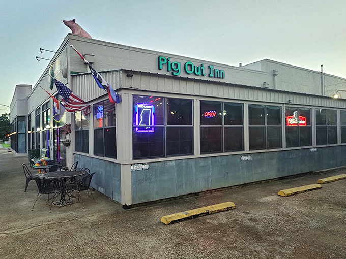 That pink pig on the roof isn't just cute &ndash; it's a beacon guiding hungry travelers to brisket paradise.