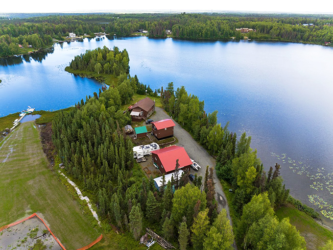 Aerial view of Soldotna shows nature and civilization in perfect harmony. The river curves through town like it's giving the place a hug.