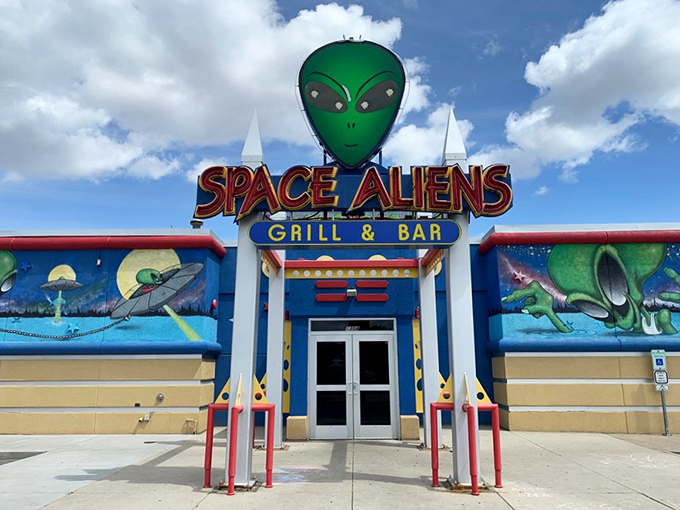 Space Aliens' vibrant exterior is like a cosmic postcard from Planet Pizza, beckoning hungry earthlings inside.