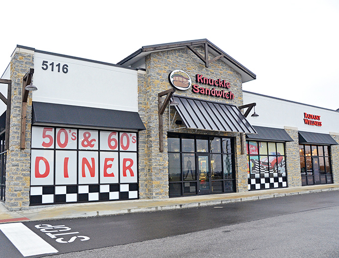 Checkerboard patterns and nostalgic diner vibes &ndash; The Knuckle Sandwich wraps you in comfort before you even take your first bite.