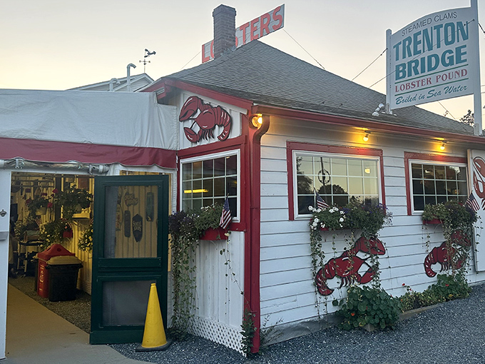 As dusk settles, this lobster landmark glows with promise. The wood-fired cookers aren't just for show!