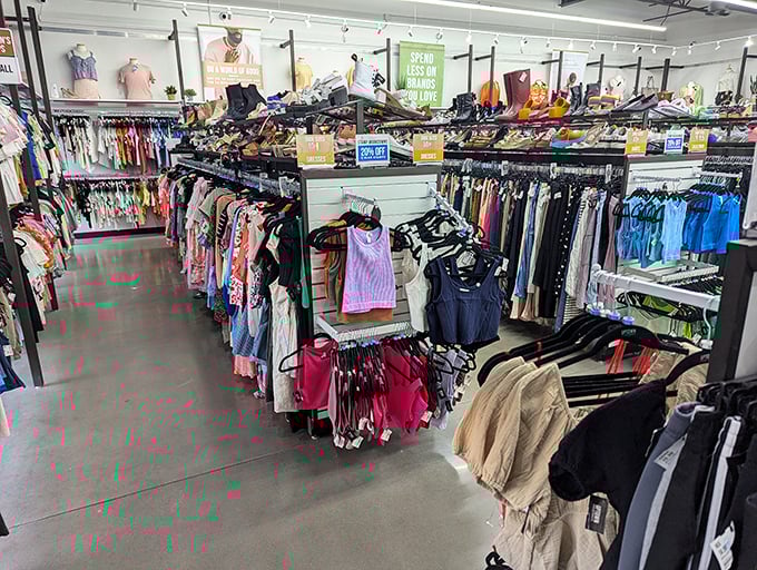 Color-coded clothing racks make finding your size a breeze at Uptown Cheapskate. Organized chaos? No, just organized!