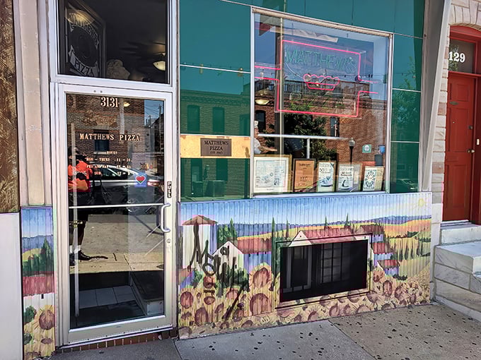 Where pizza artistry meets Baltimore tradition. That hand-painted storefront mural is just a preview of the creativity happening inside.