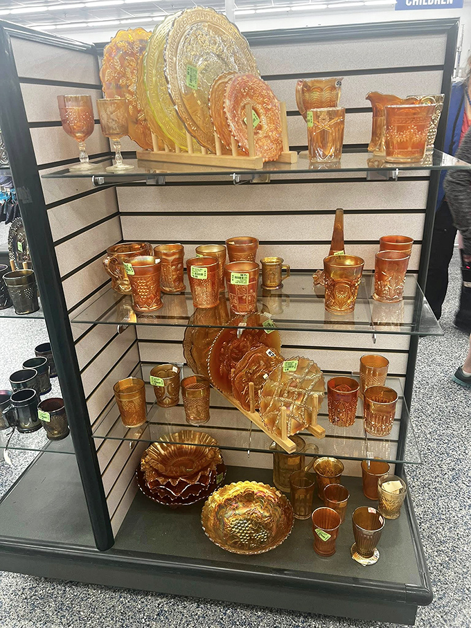 Amber glassware that would make your grandmother swoon, arranged like honeyed jewels waiting to grace dinner tables once again.