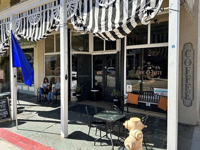 Choc-O-Latte's inviting porch proves that sometimes the best travel experiences happen while sitting still, watching the world with coffee in hand.