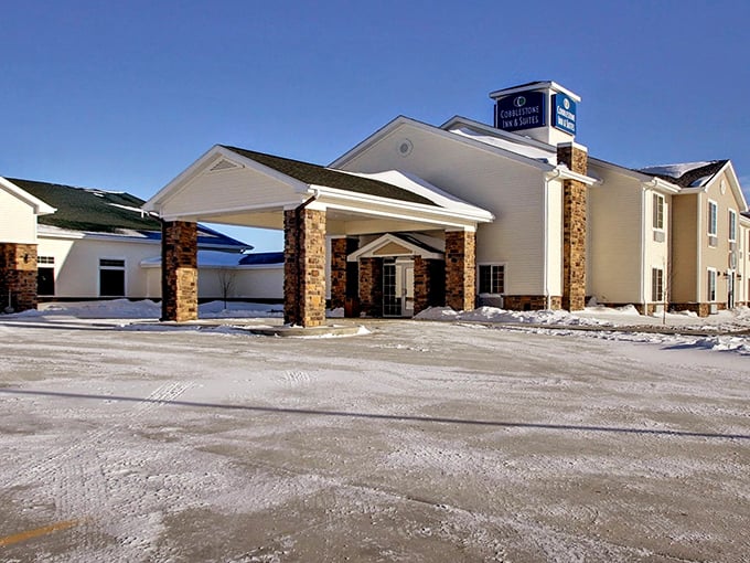 The Cobblestone Inn stands ready for winter visitors&mdash;like a warm lighthouse beckoning travelers through North Dakota's snow-globe landscapes.
