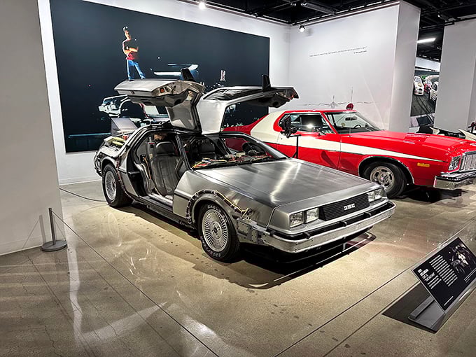 Great Scott! The DeLorean DMC-12 from "Back to the Future" waits patiently at 1.21 gigawatts, ready to transport visitors through automotive time.