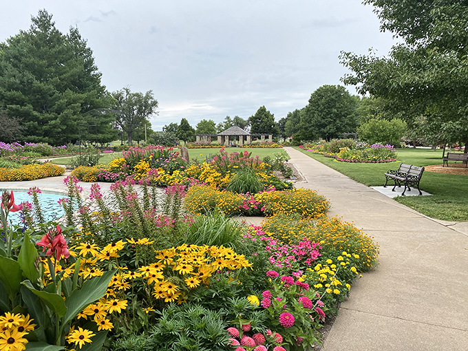 Mother Nature showing off in Eisenhower Park. These gardens don't just bloom—they explode with color, creating a peaceful oasis that would make even the most dedicated antique hunter pause.