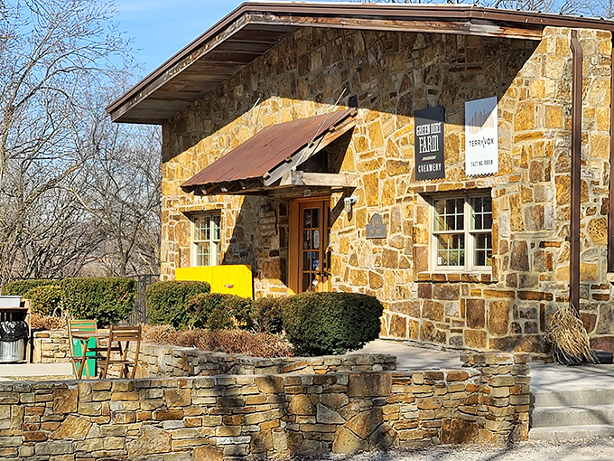 This isn't just any stone building – Green Dirt Farm Creamery's rustic charm houses award-winning sheep's milk cheeses that would make a Frenchman weep with joy.