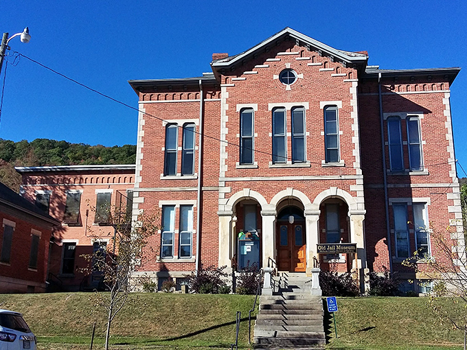 The Historical Society building stands as Smethport's architectural crown jewel, its red brick and white columns telling stories of prosperity from a bygone lumber era.