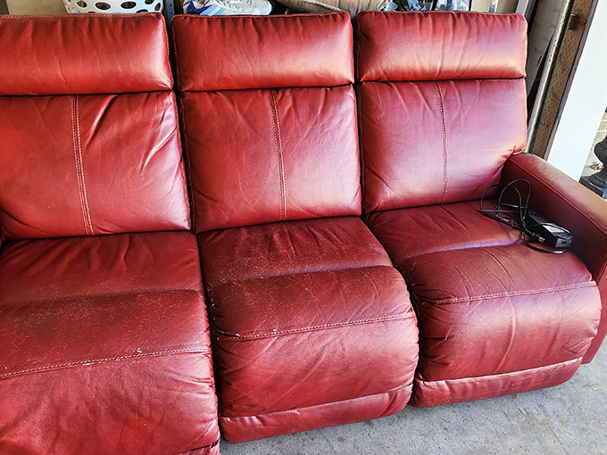 This red leather recliner sofa isn't just comfortable – it's practically begging to host your next Netflix marathon.