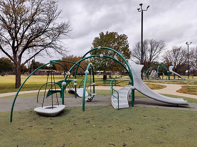 Even the playgrounds in Lubbock have architectural ambition. These whimsical green arches provide the perfect spot for kids to burn off that barbecue energy.