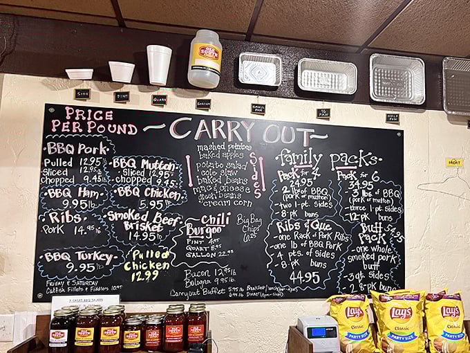 The chalkboard menu at Ole South isn't just information—it's a roadmap to happiness with family packs that could feed a small militia.