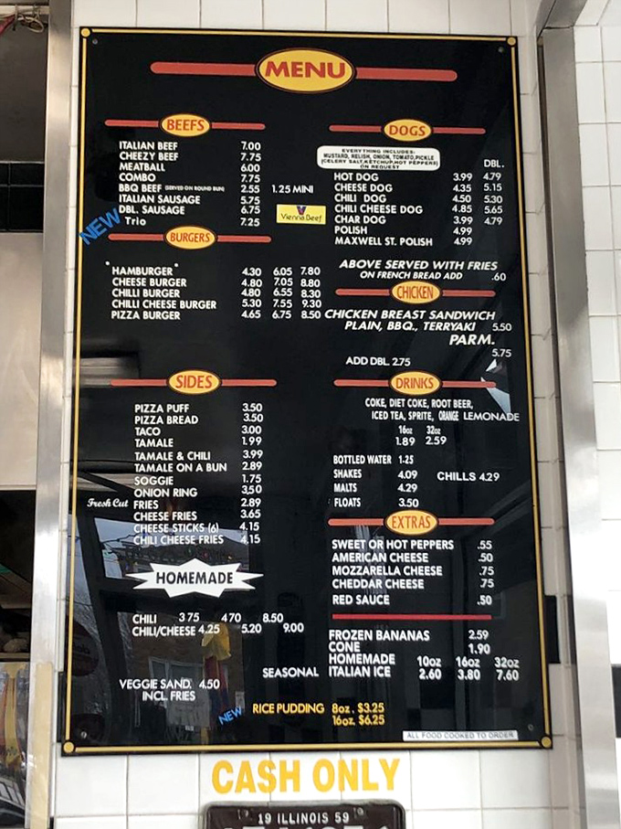 This menu board is Chicago's version of the Rosetta Stone, deciphering the sacred language of beef, dogs, and the mysterious "tamale on a bun."