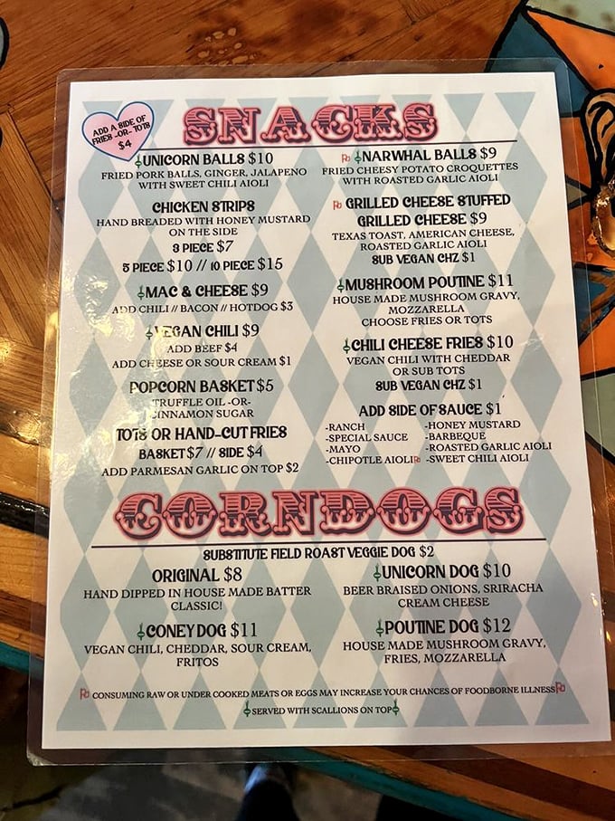 The menu reads like a state fair food competition where every entry decided to break the rules. Unicorn Balls? Narwhal Balls? Count me in!