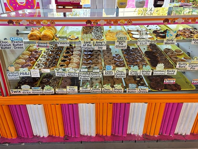 The display case is a United Nations of donut diplomacy&mdash;where Nutella, Oreo, and Fruity Pebbles peacefully coexist in sugary harmony.