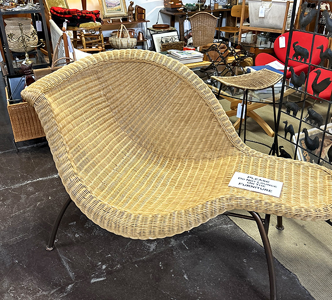 This wicker chaise doesn't just invite you to sit&mdash;it practically whispers, "Let's discuss your memoir while sipping something with gin in it."