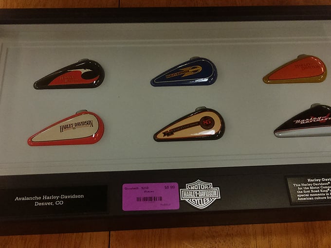 One person's motorcycle memorabilia is another's man cave masterpiece. These Harley-Davidson gas tank emblems are waiting for their second ride.